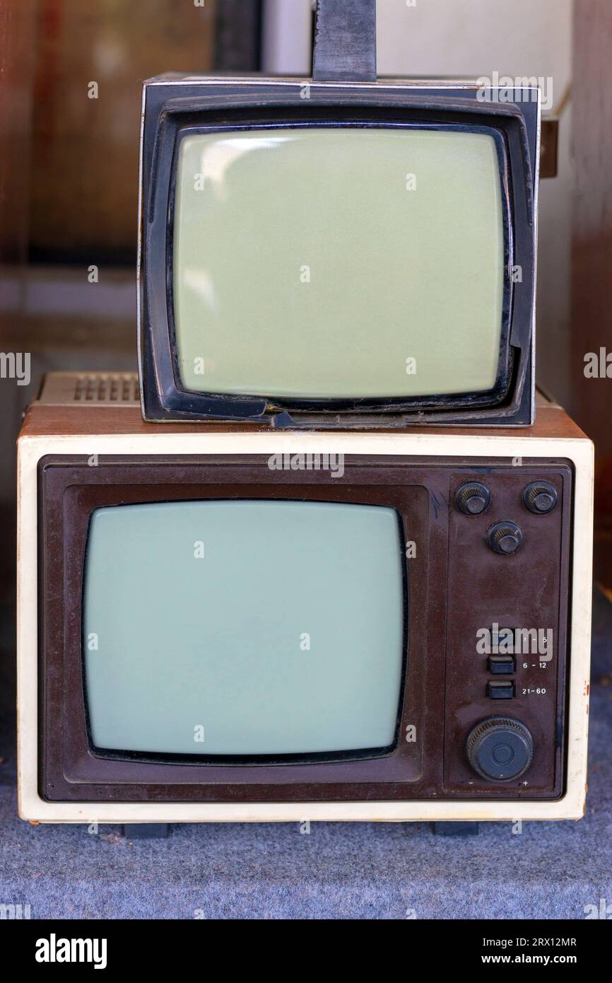 Many retro television. vintage old TV is colorful multi-row. Seeing the ...