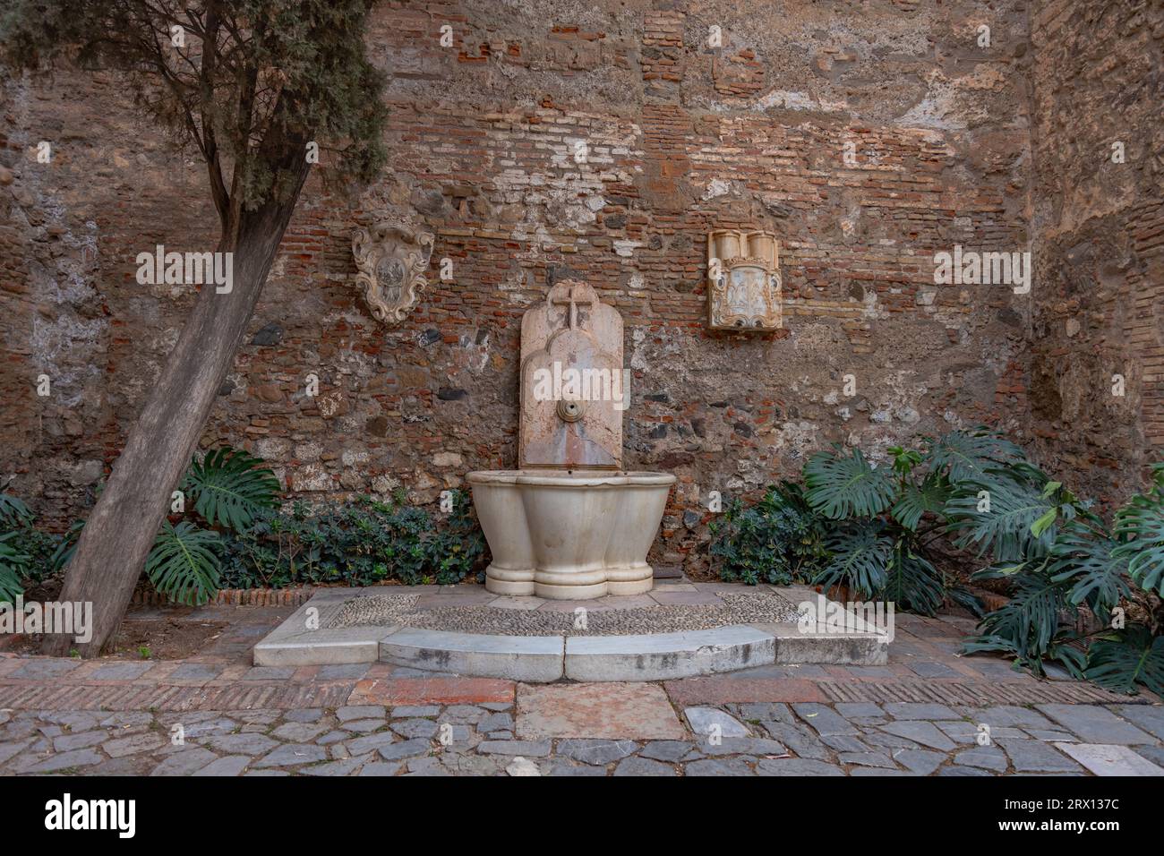 The Alcazaba interior, citadel of Malaga city. Interiors and courtyards ...