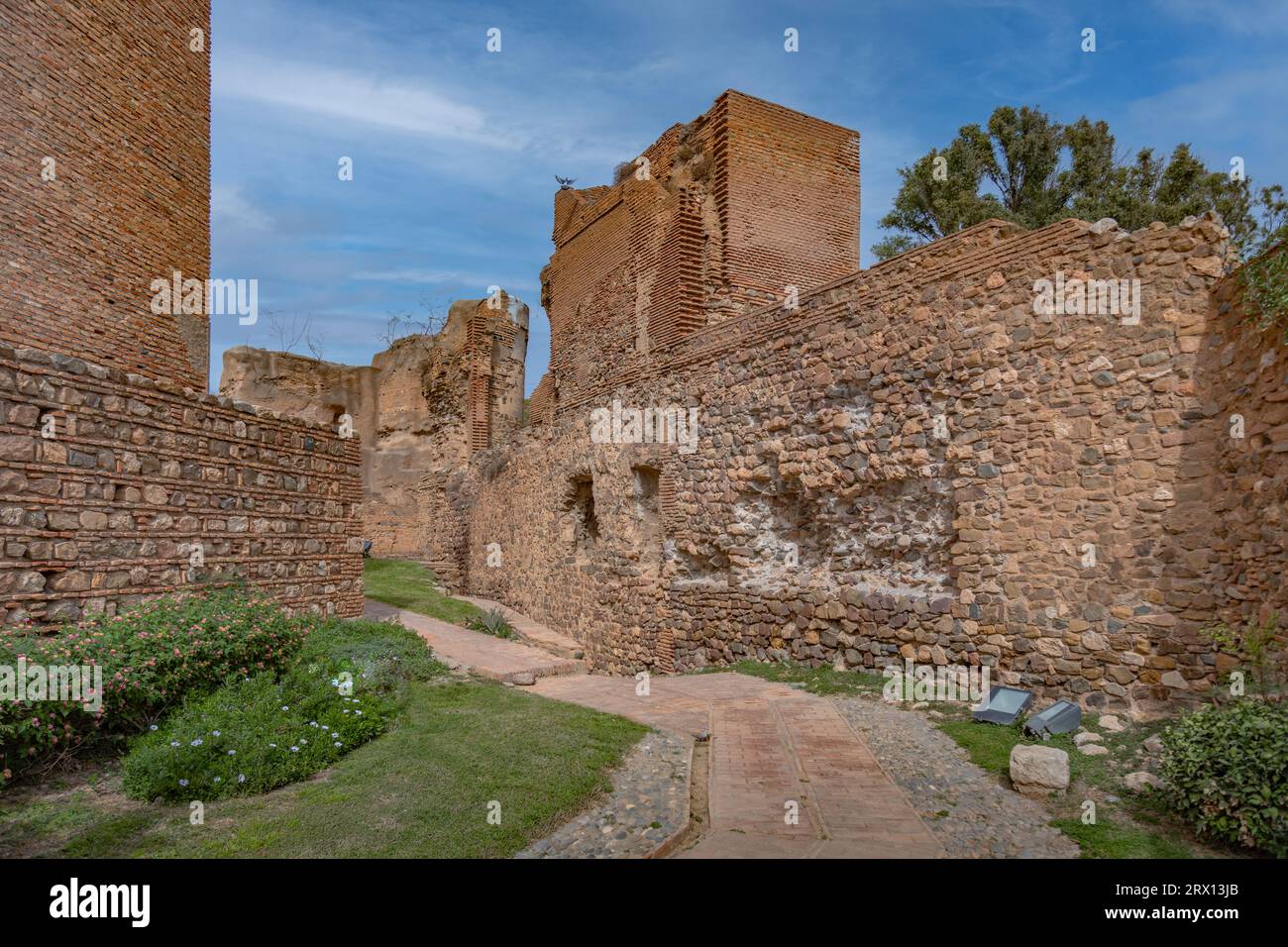 The Alcazaba interior, citadel of Malaga city. Interiors and courtyards ...