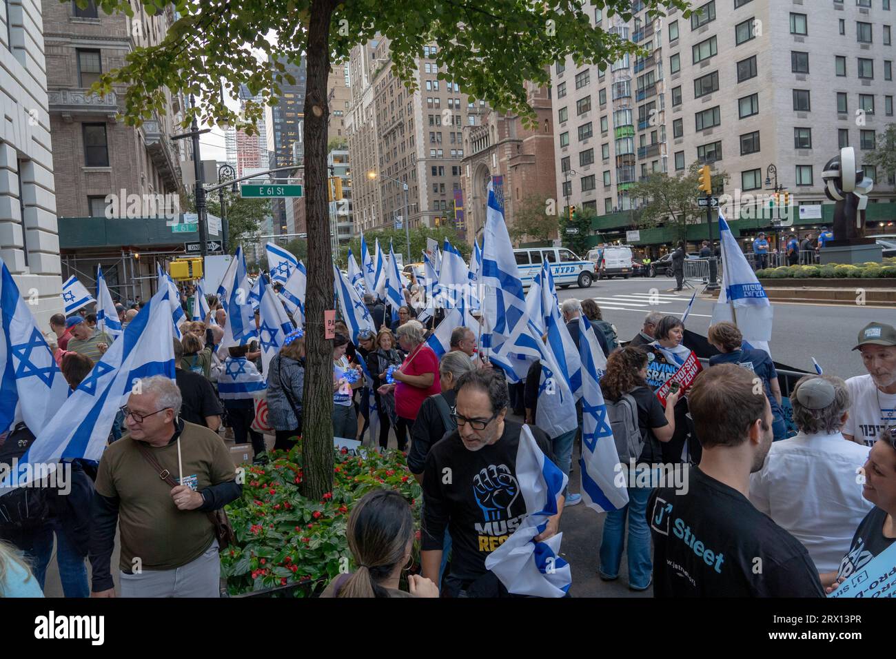 Mostly Israeli Expat holding Israeli flags and signs in support of ...