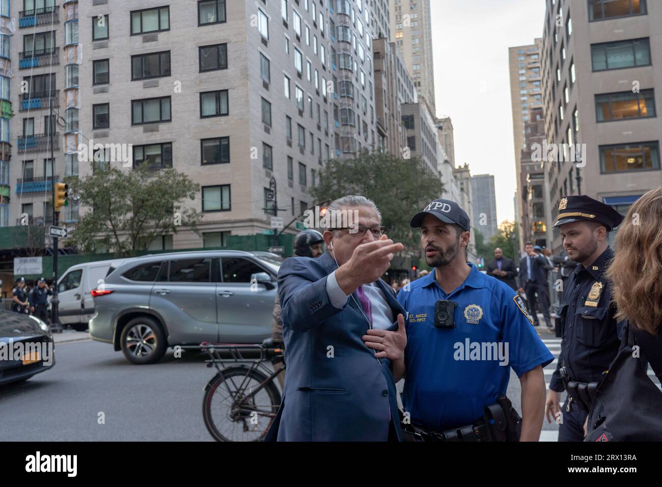 NYPD police officers separate a pro-Netanyahu protester that clashes ...