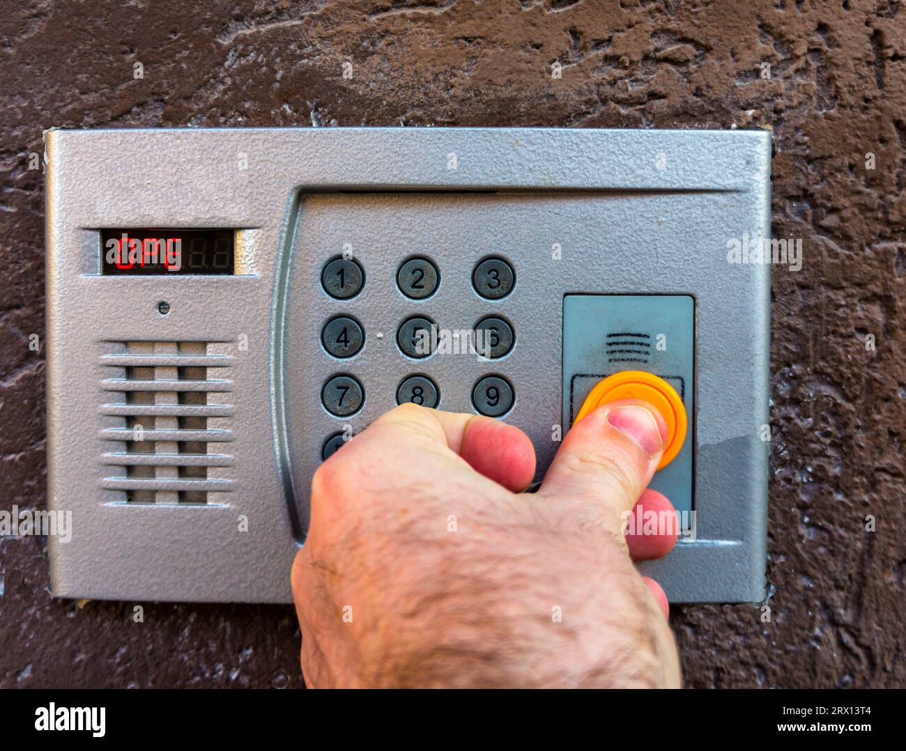 hand with the key from the intercom, the inscription on the scoreboard ...