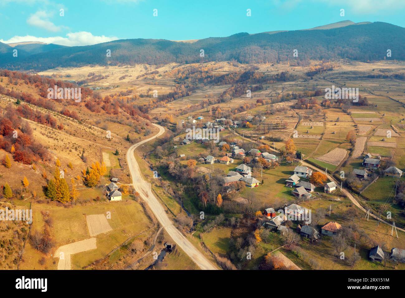 Aerial view of the countryside, country road, and village in the ...