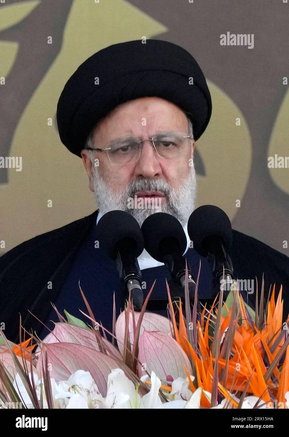 Iranian President Ebrahim Raisi speaks during an annual military parade ...