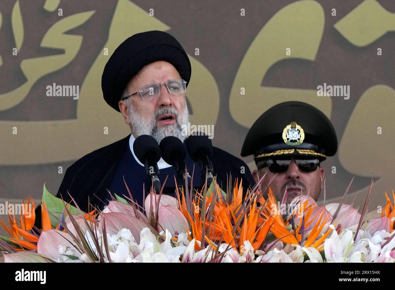 Iranian President Ebrahim Raisi speaks during an annual military parade ...