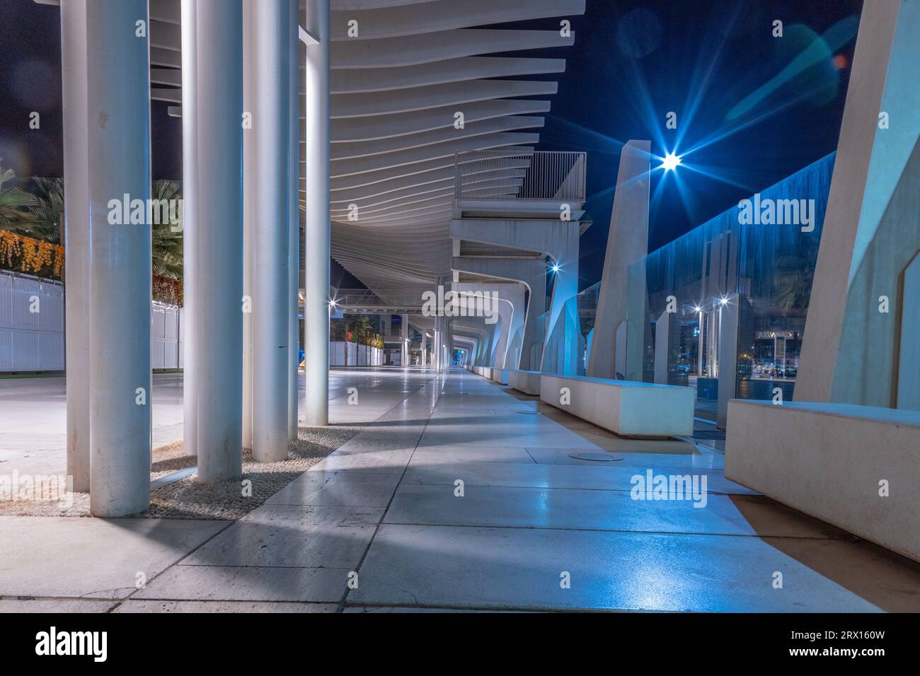 Public promenade in Malaga, Parmeral de las Sorpresas at late night in ...