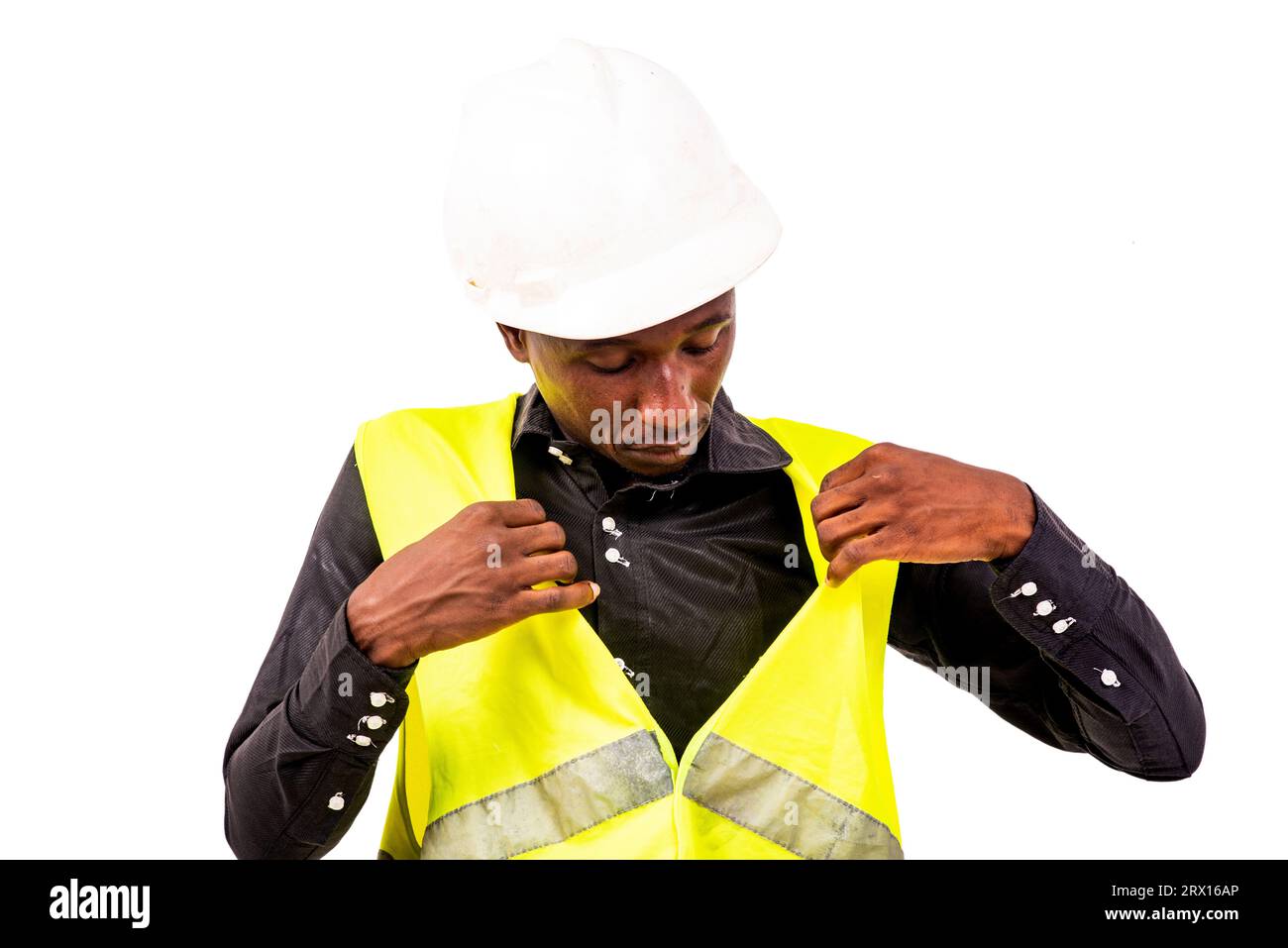 portrait of a handsome young man engineer dressing for work Stock Photo ...