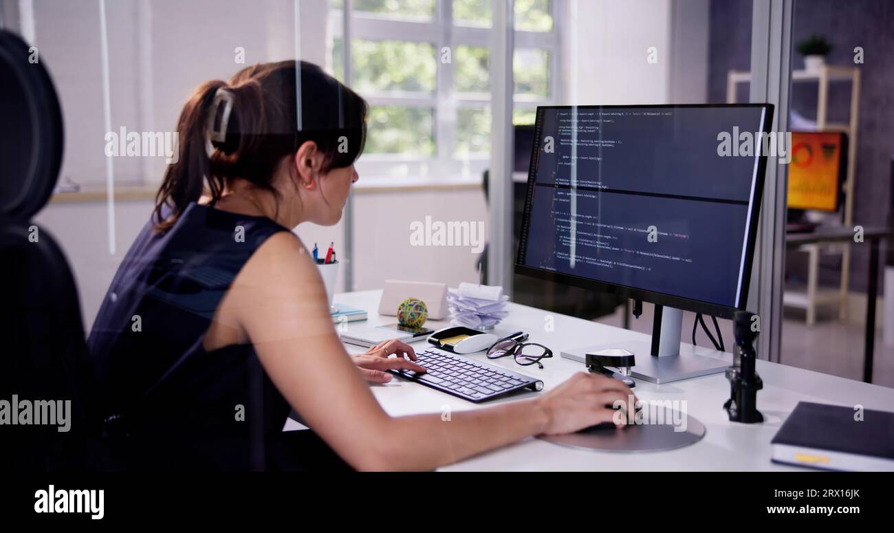 Software Programmer Or Coder Woman Using Office Computer Stock Photo - Alamy