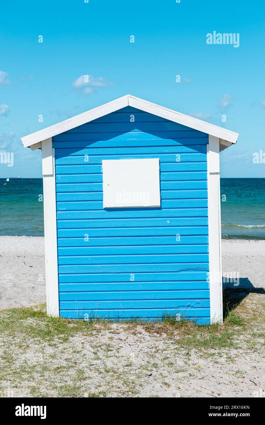 Frontal view of the back of a blue white wooden bathing hut on the ...