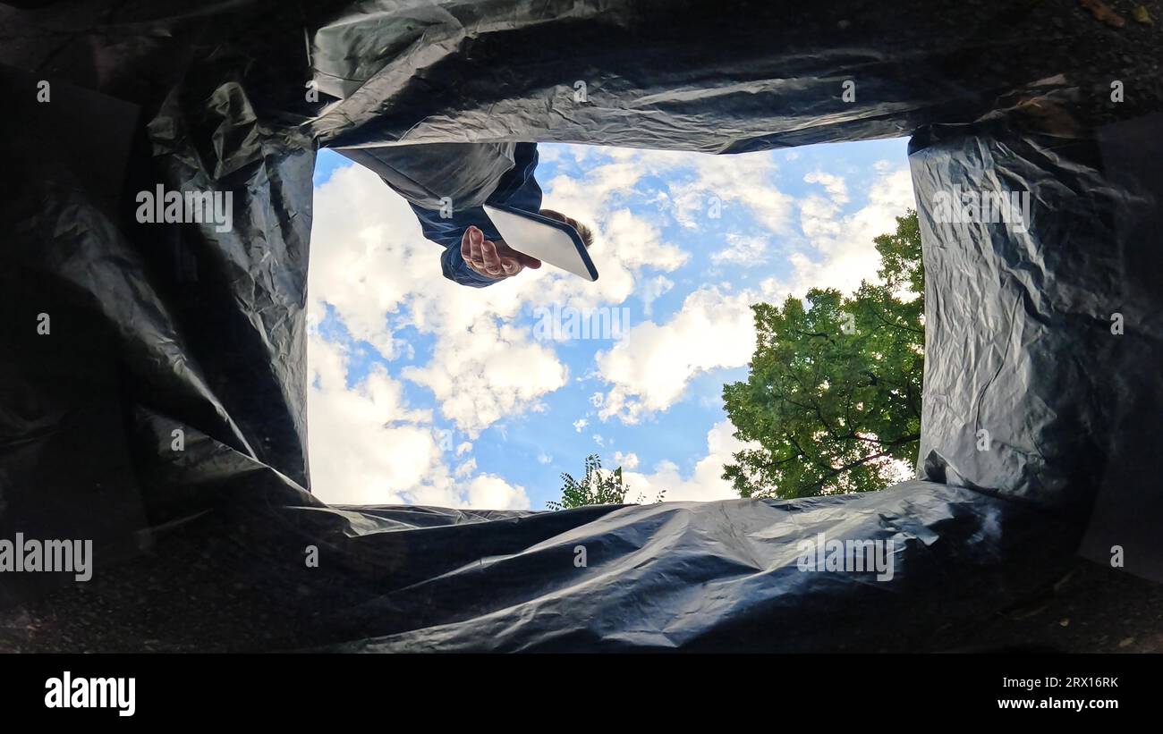 Man Throwing Away Smartphone. Old Technology Garbage Stock Photo - Alamy