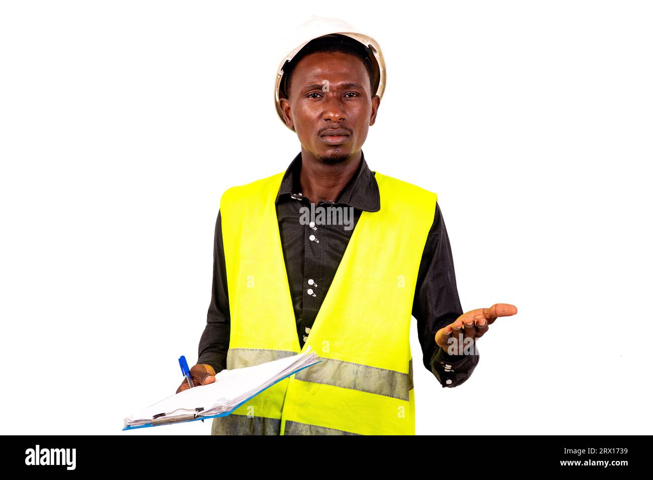 portrait of an angry young man architect wearing a green vest and ...