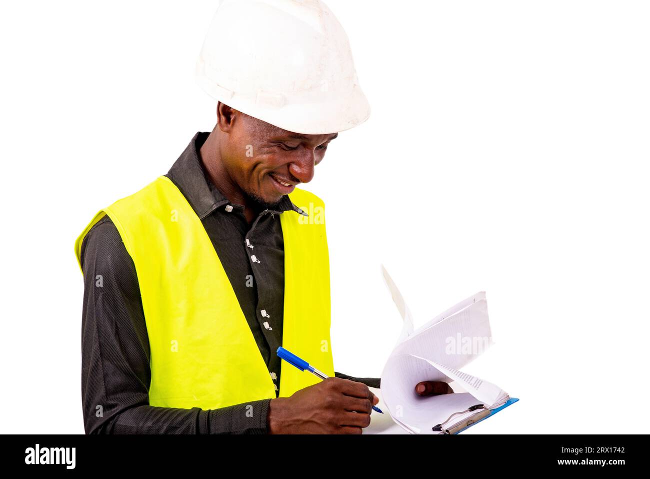 young man inspector architect wearing green vest and safety helmet ...