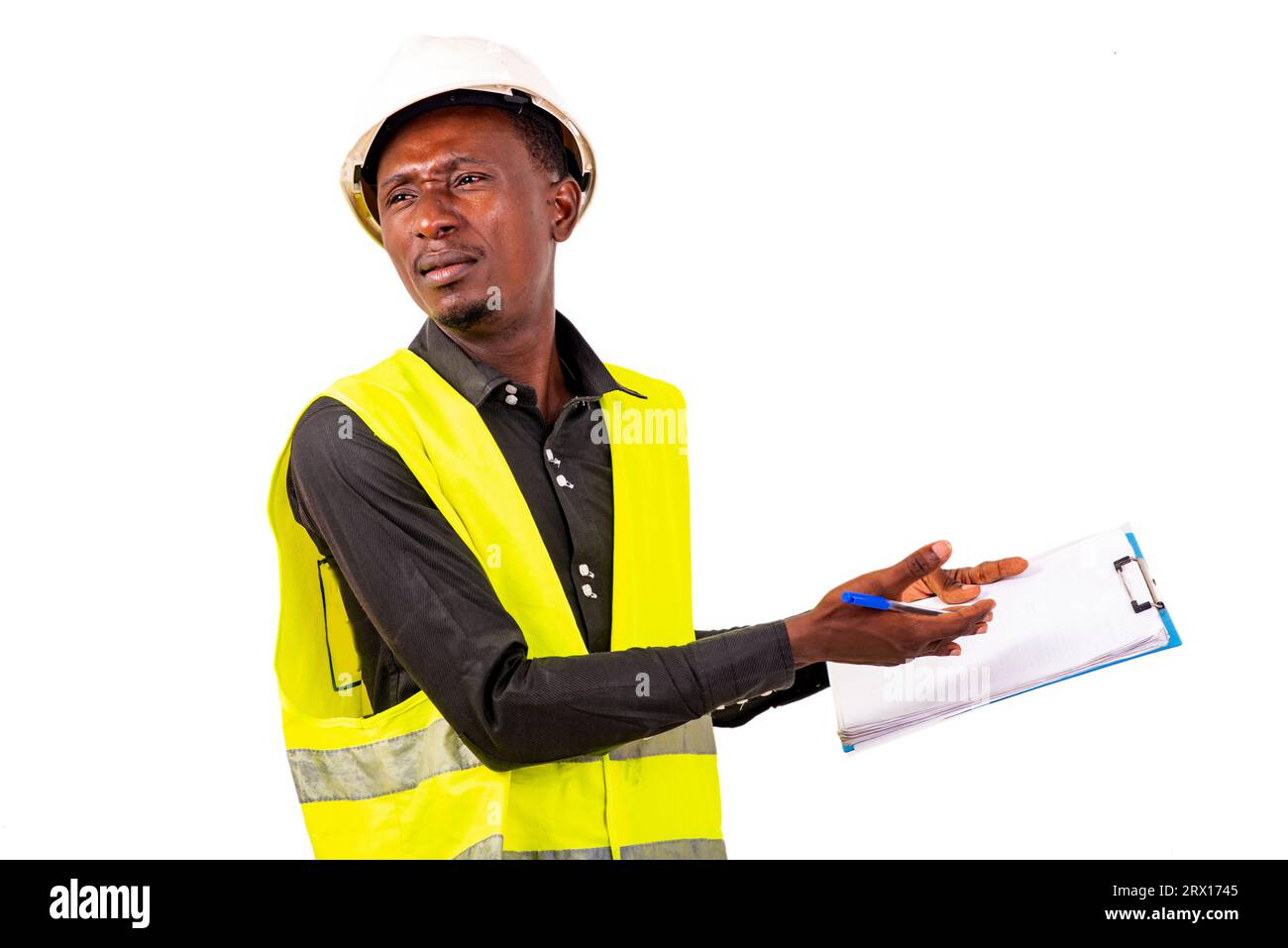portrait of an angry young man architect wearing a green vest and ...