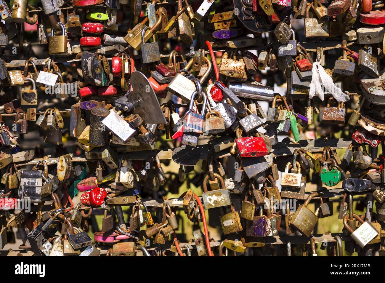 lot of locks, different color and the size. A wall of the closed locks ...