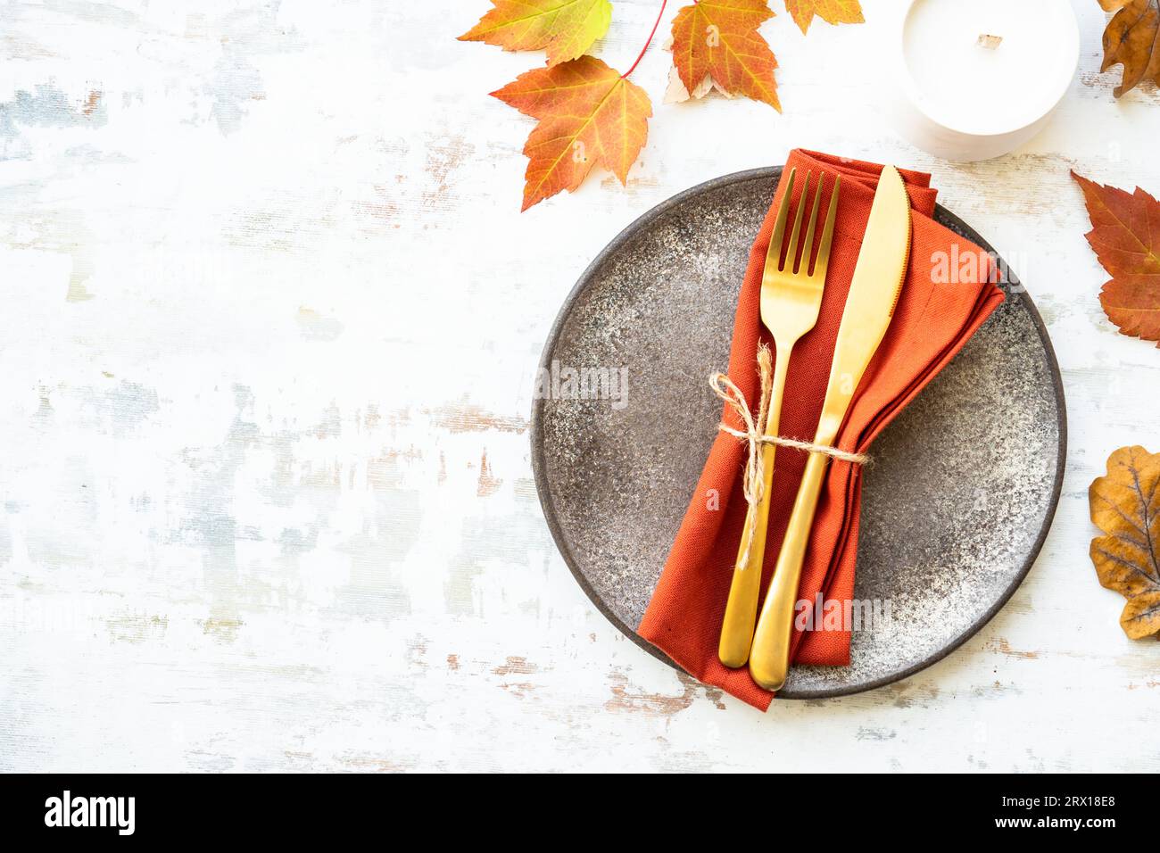 Autumn table setting on white background Stock Photo - Alamy