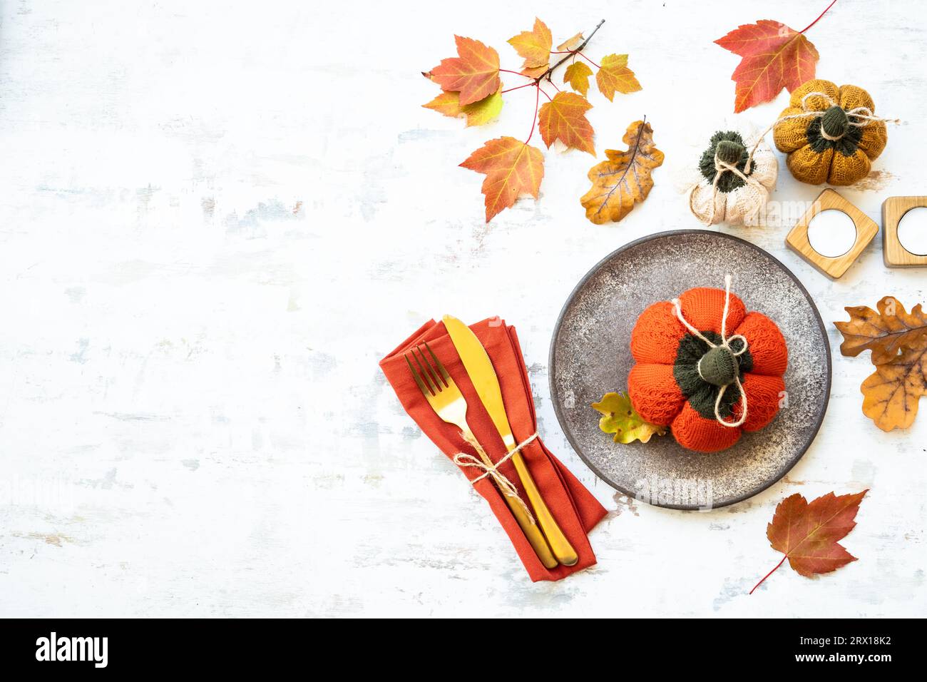 Autumn table setting on white background Stock Photo - Alamy
