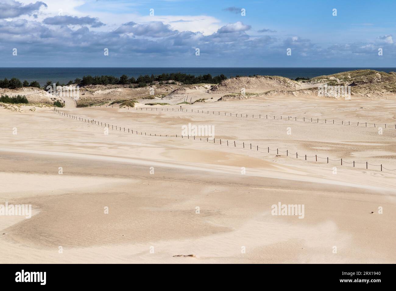 Tourist trail through the moving sand Lacka gora dune near Leba village ...