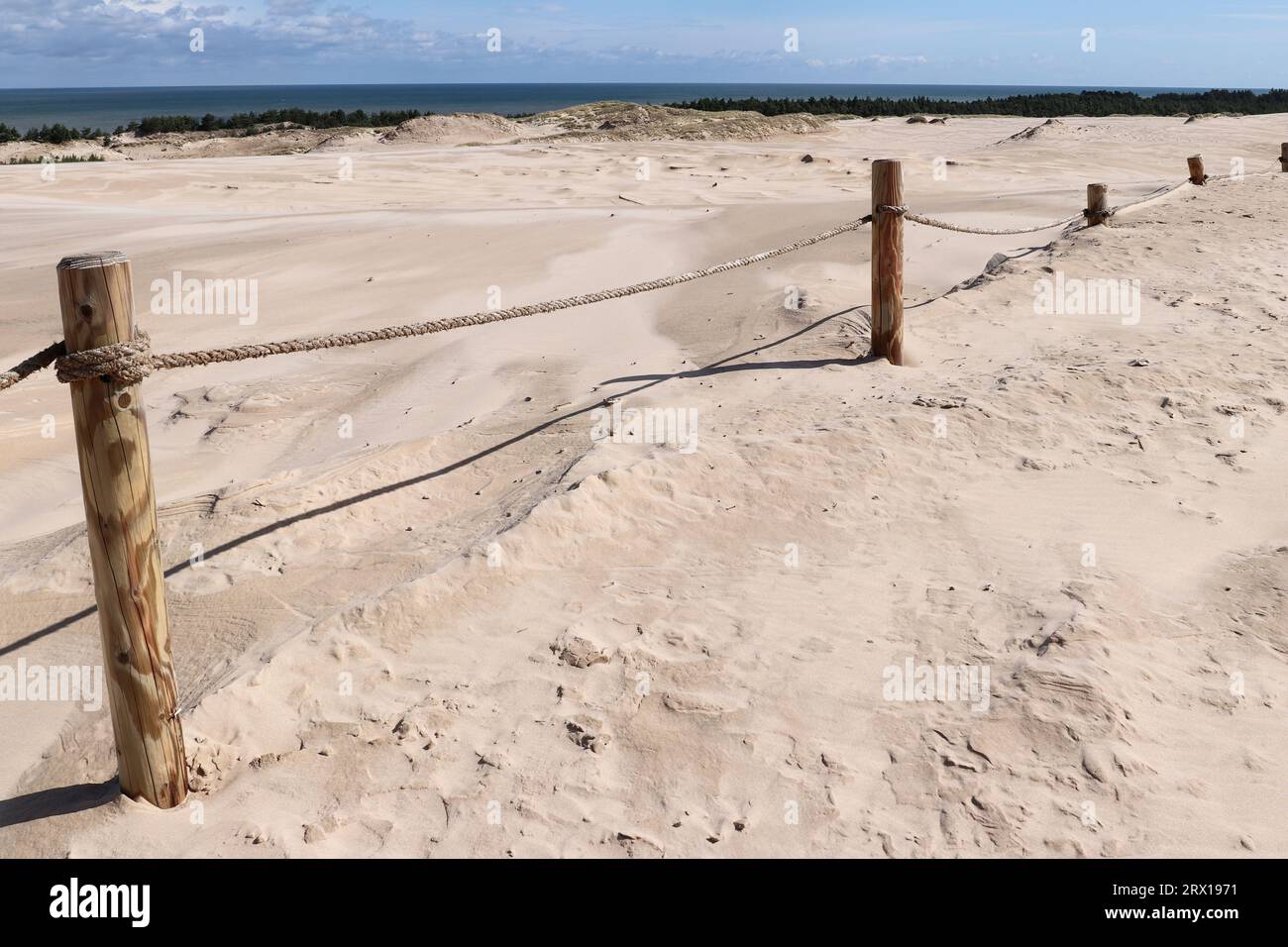 Tourist trail through the moving sand Lacka gora dune near Leba village ...