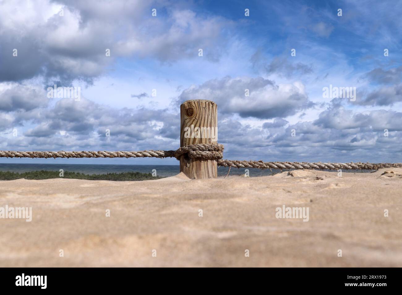 Pillar covered in sand on the hiking trail through the Lacka gora dune ...