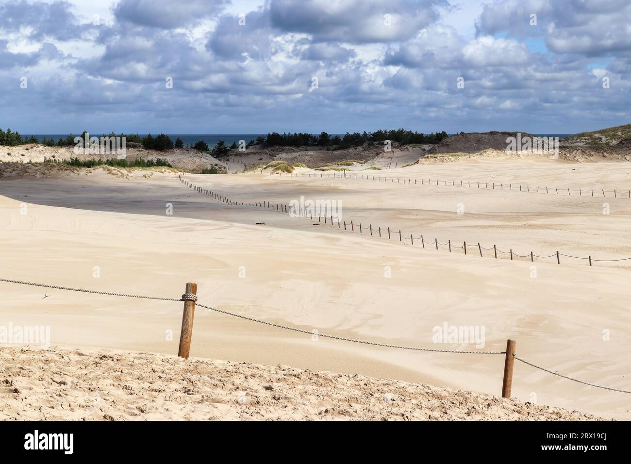 Tourist trail through the moving sand Lacka gora dune near Leba village ...