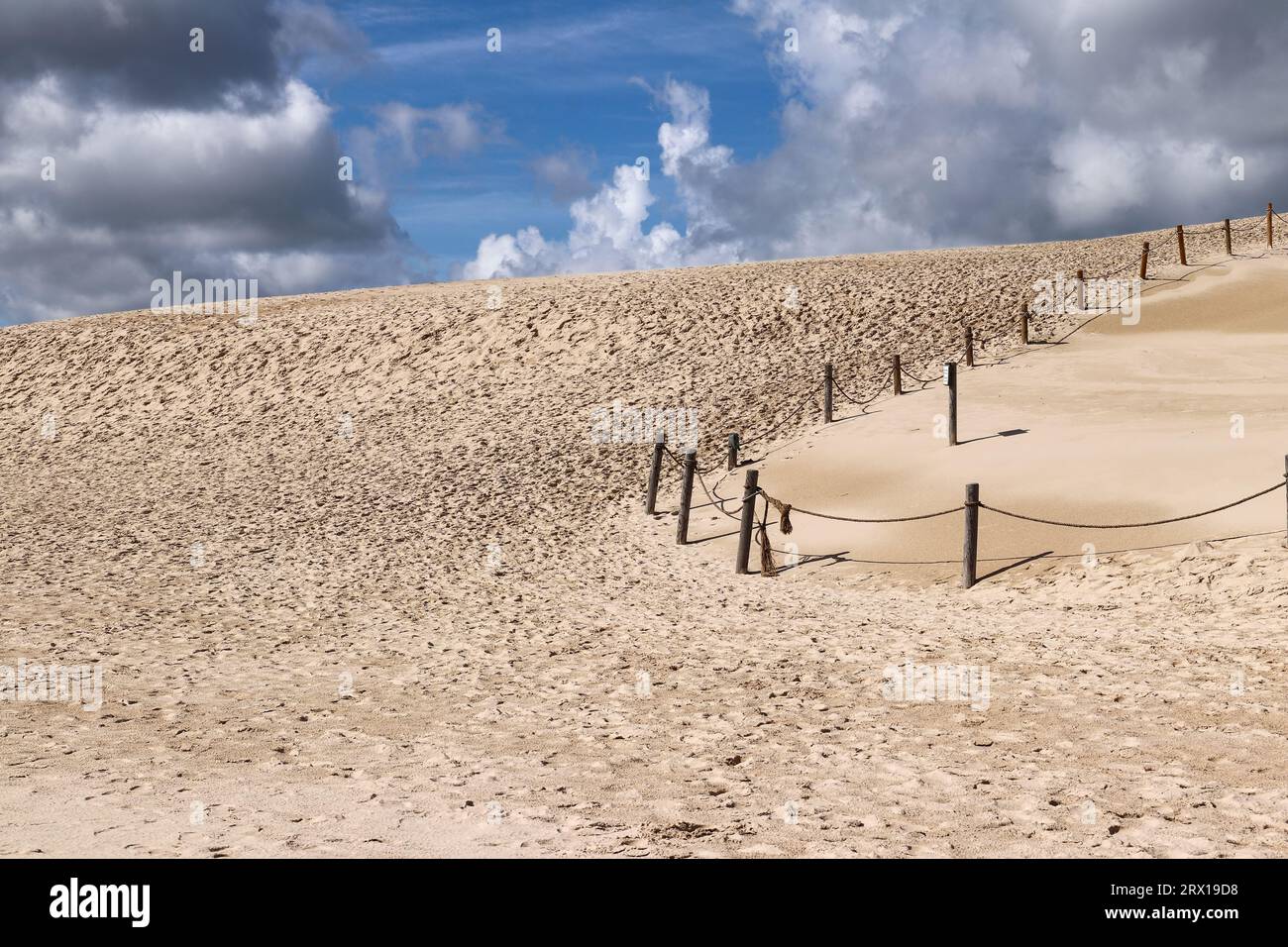 Hiking trail through the moving sand Lacka gora dune near Leba village ...