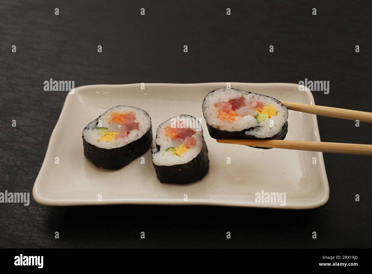 Rolled sashimi hi-res stock photography and images - Alamy