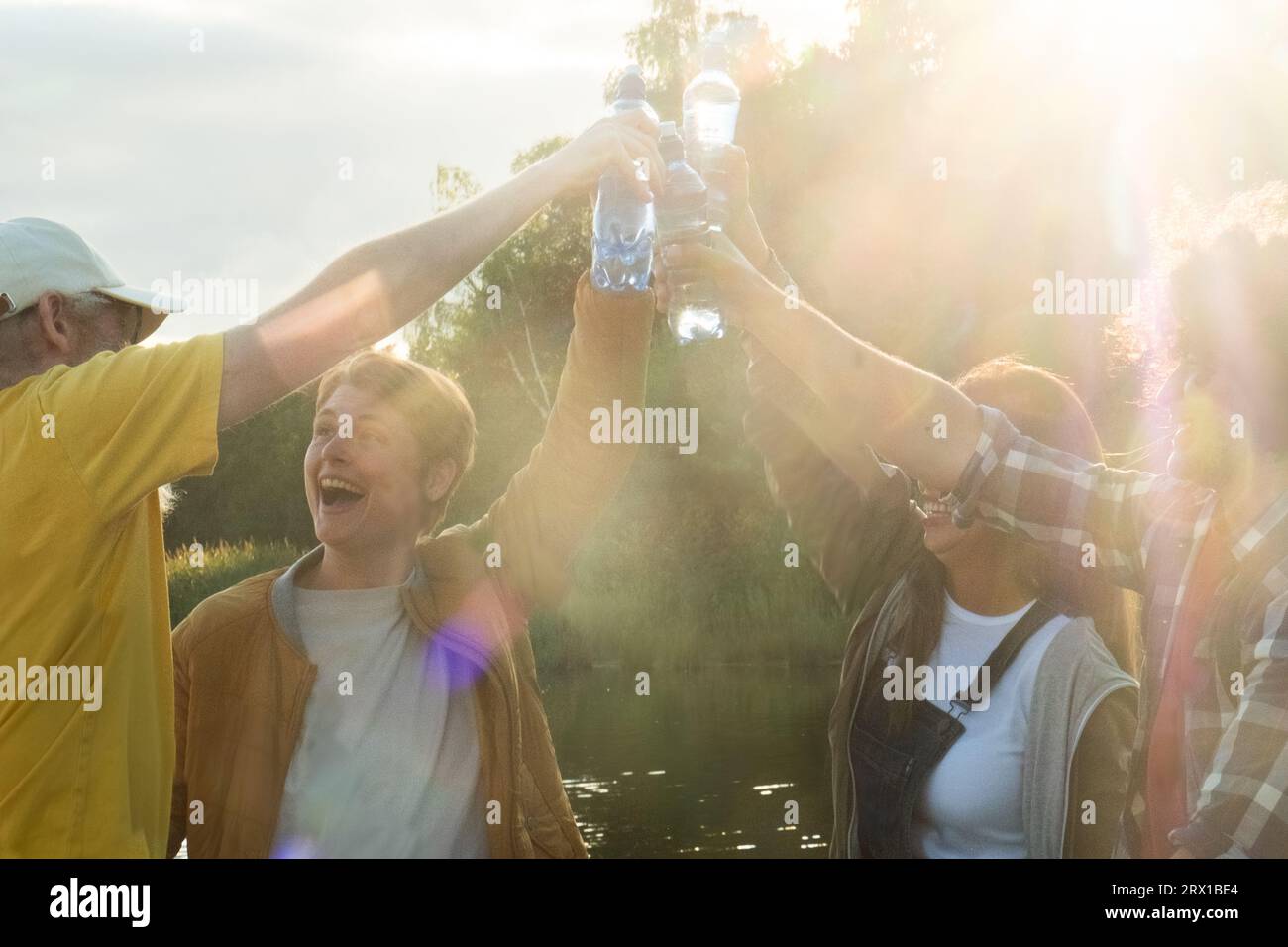 Cheers. Healthy millennial multiracial group of friends cheering with ...
