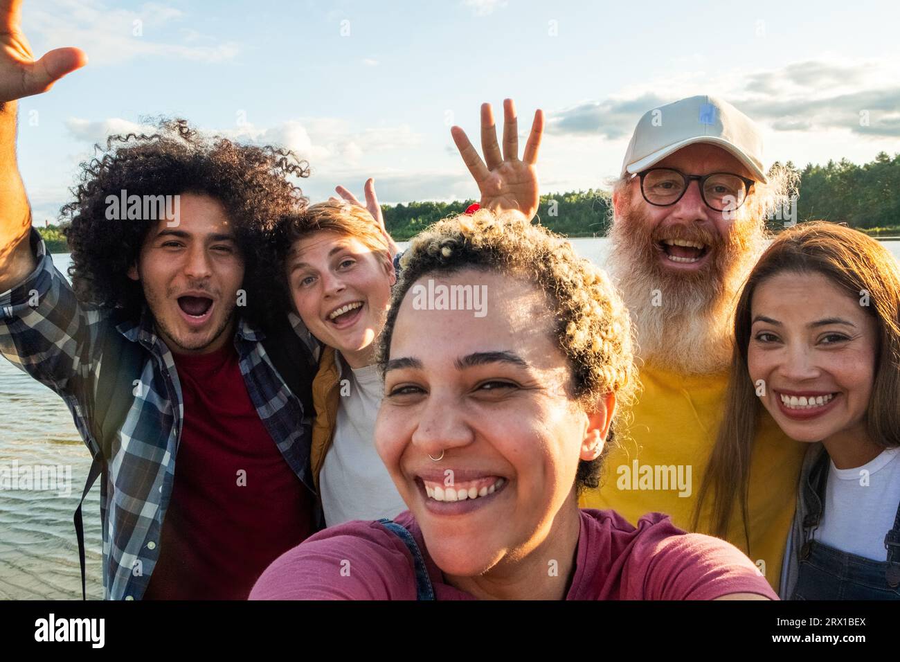 Multiracial young group of trendy people having fun together on vacation - Diverse millennial ...