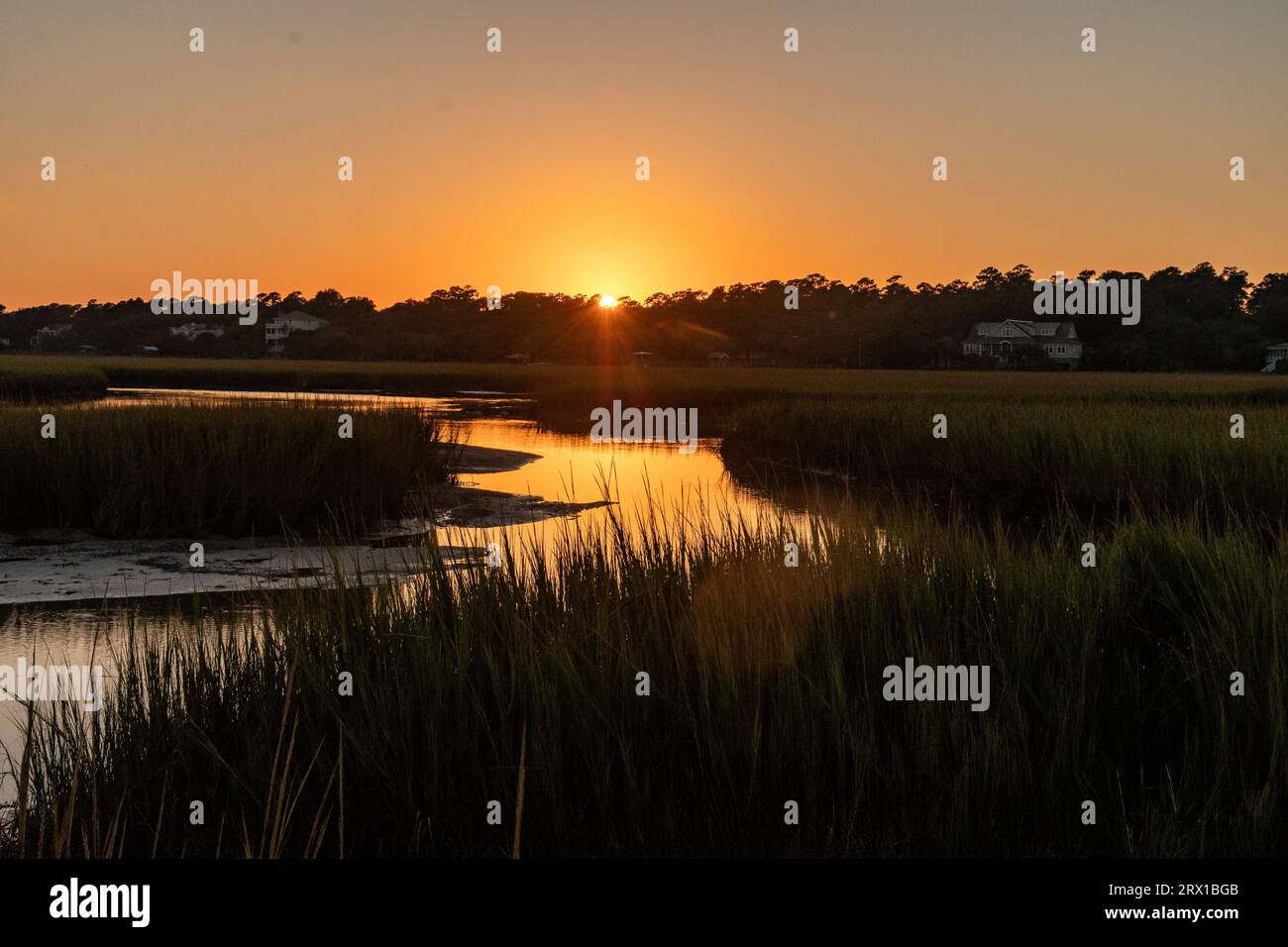Sunset over the Salt Marsh of pawleys island sound Stock Photo - Alamy