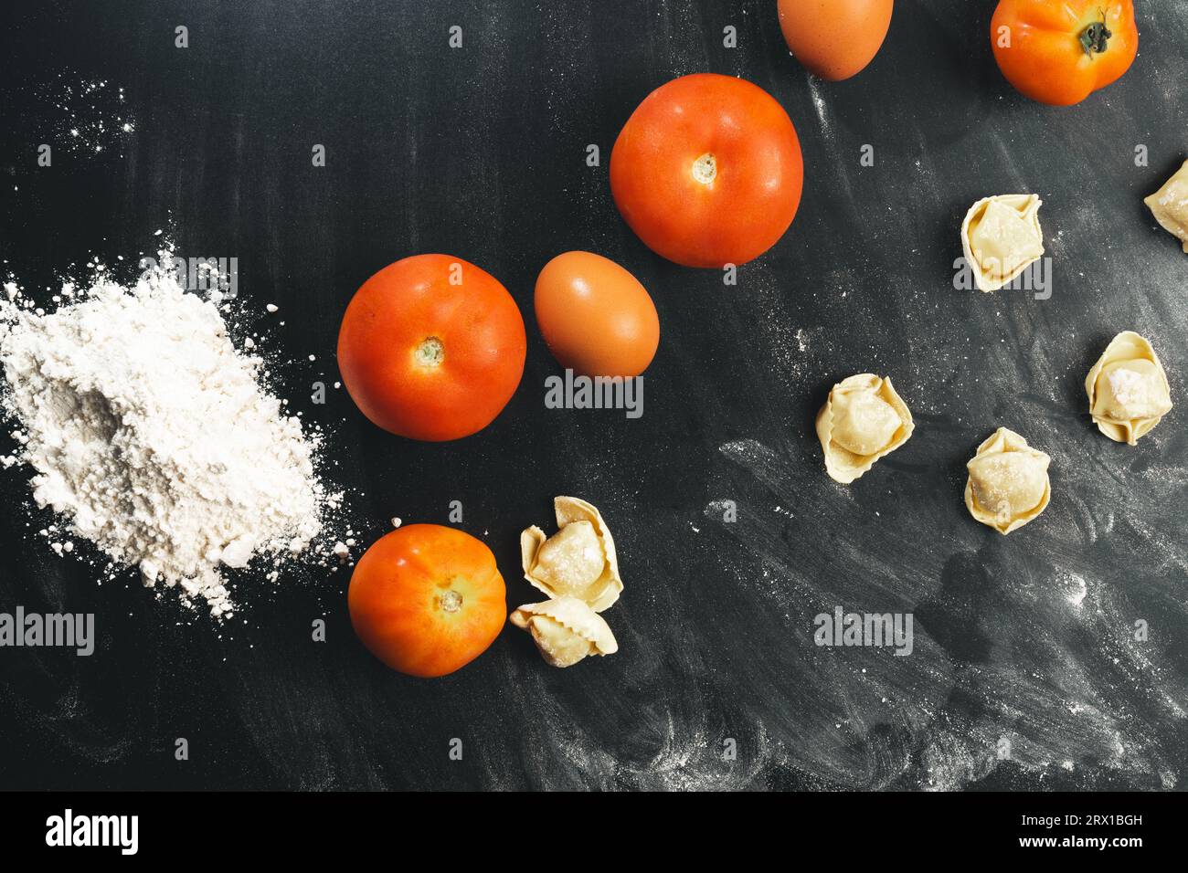 ravioli eggs tomatoes flour easy recipe Stock Photo - Alamy