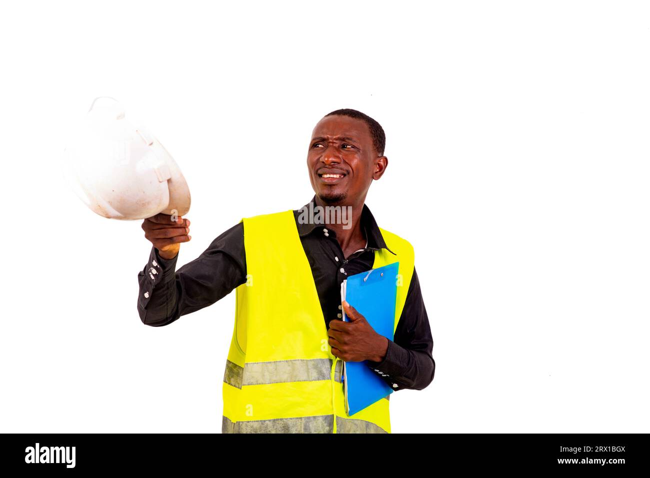 young man inspector architect wearing green vest and dyed safety helmet ...