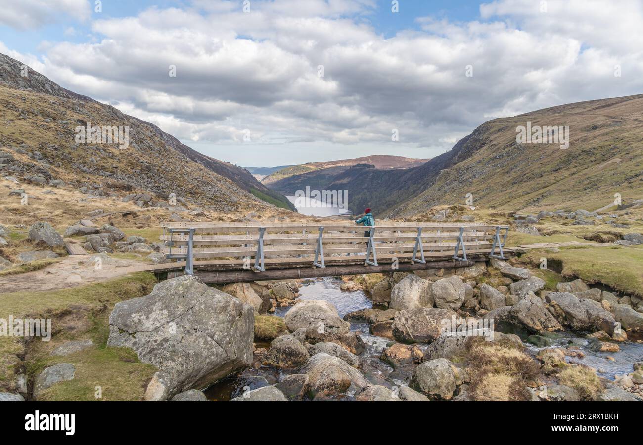 The Wicklow's Beauty: Woman on Bridge Overlooking Mountains and Lakes ...