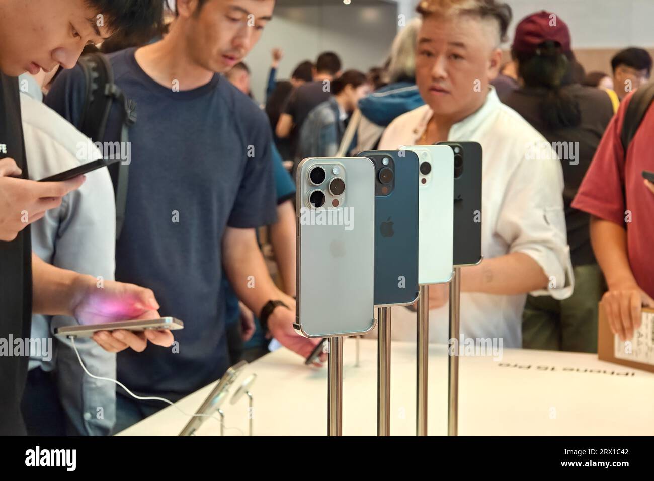 SHANGHAI, CHINA - SEPTEMBER 22, 2023 - Customers experience an iphone ...
