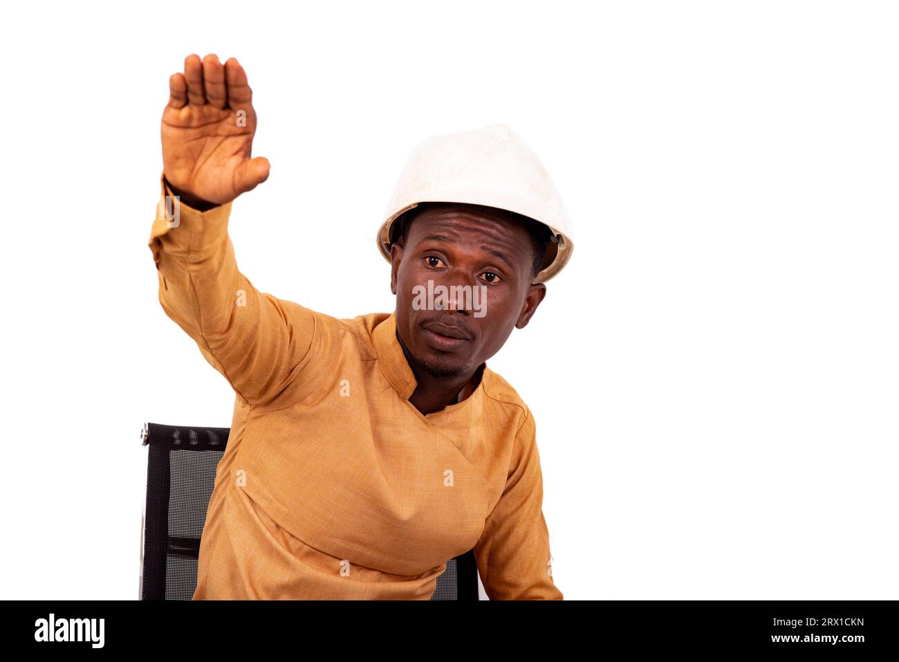young business man engineer wearing white hard hat sitting on chair ...