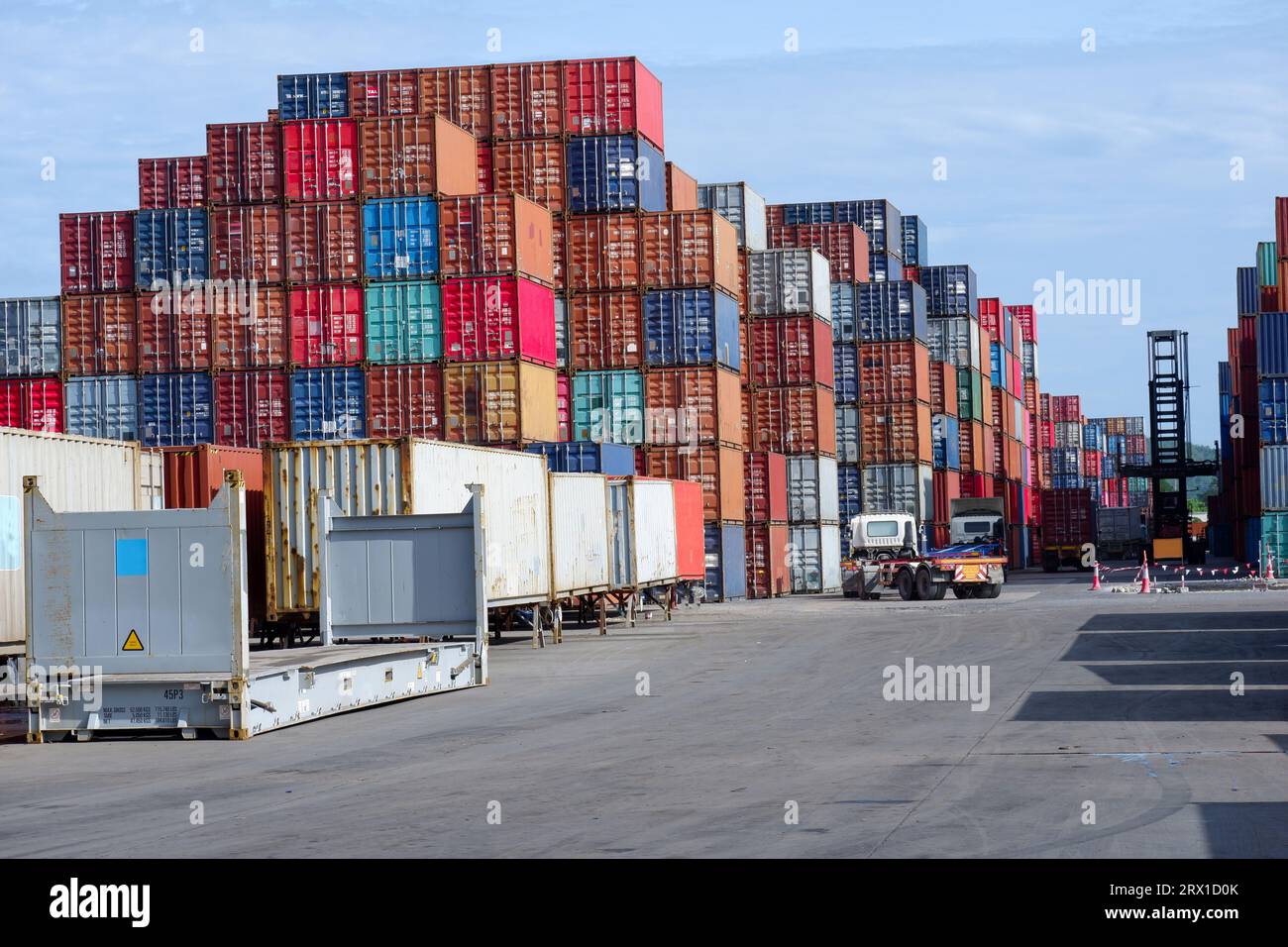 Containers piled up at the port Stock Photo - Alamy