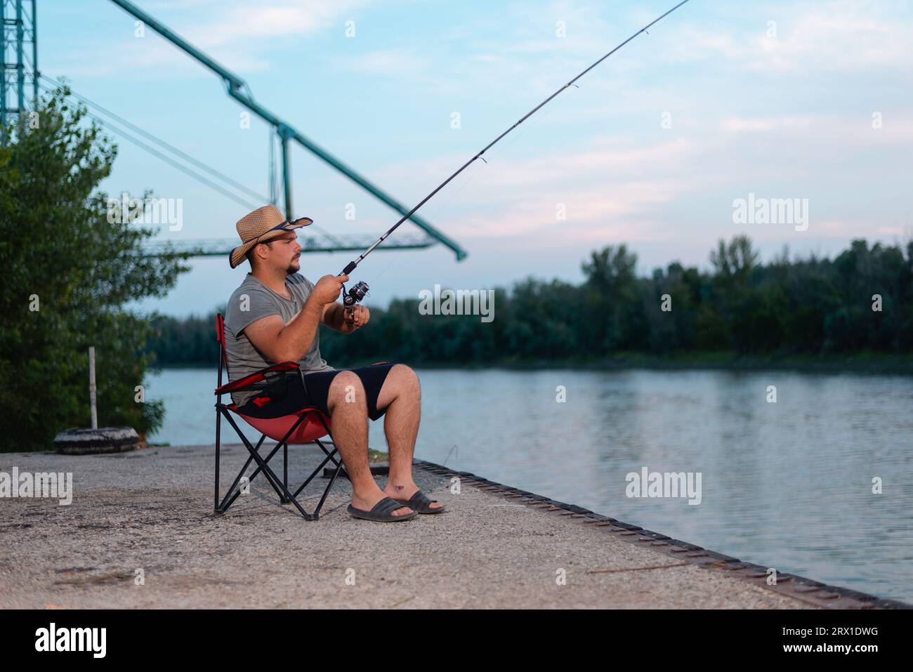 Man fisherman fishing rod hi-res stock photography and images - Alamy