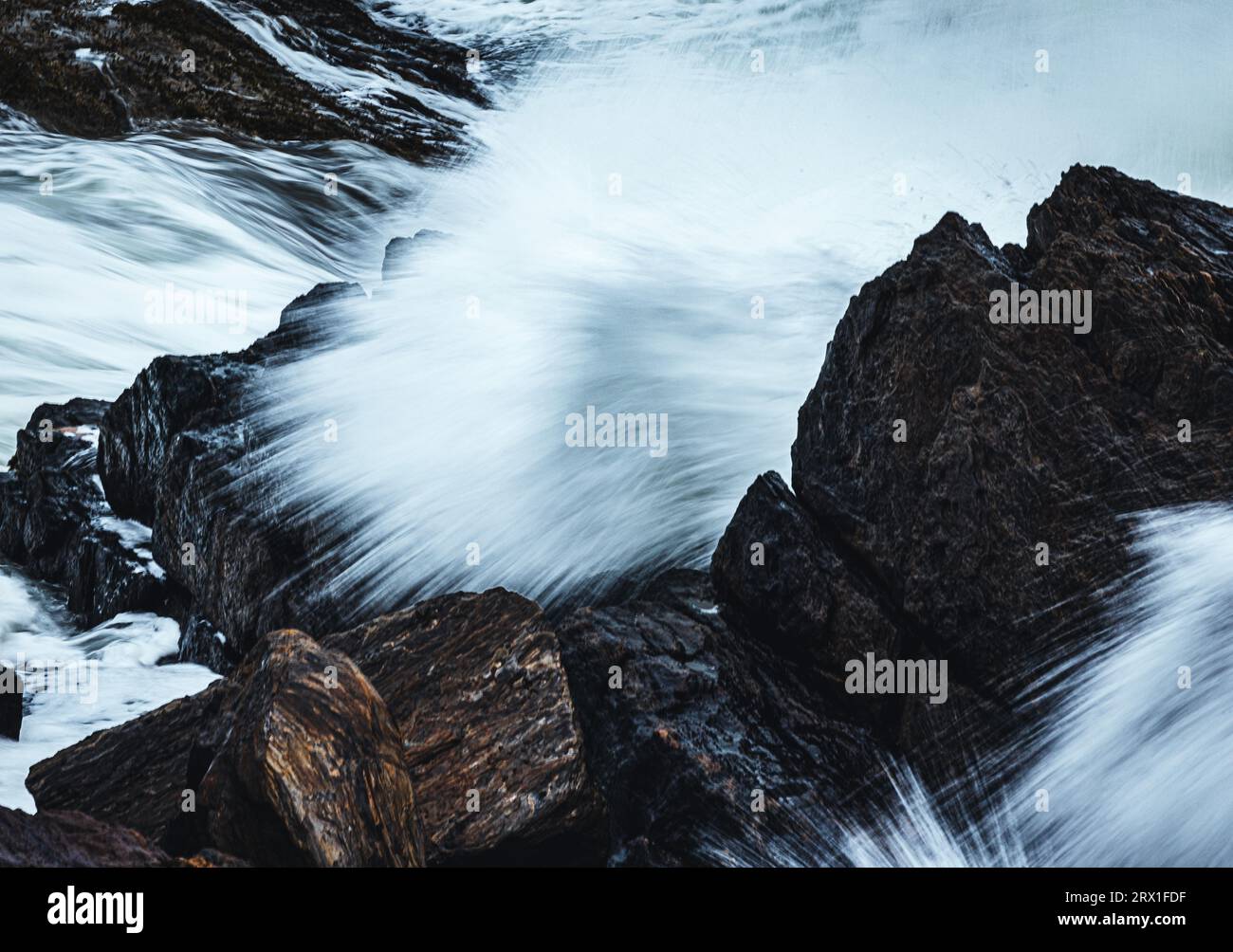 Waves breaking on rocks along hi-res stock photography and images - Alamy
