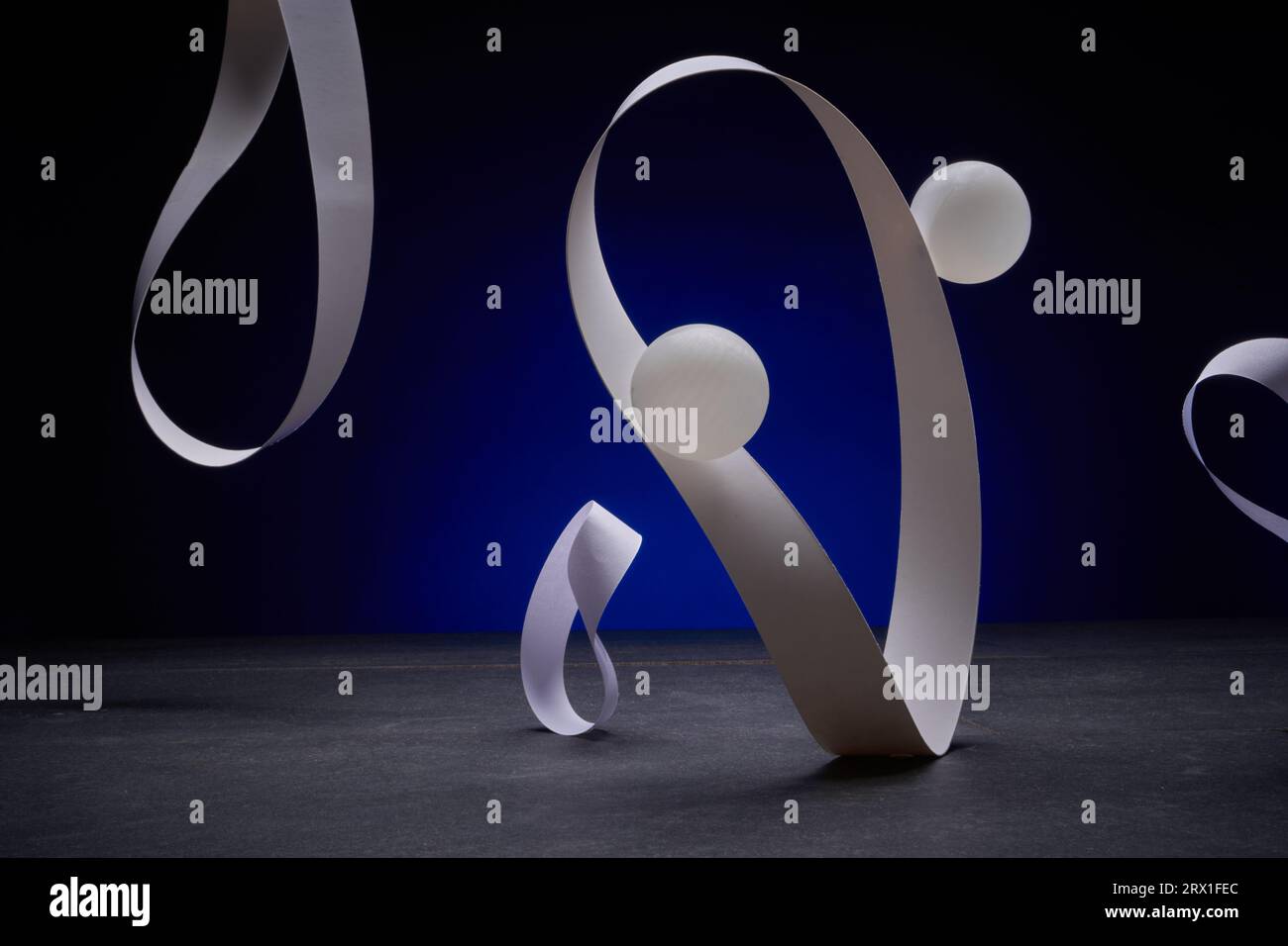 Mobius strip with spheres running the circuit Stock Photo - Alamy