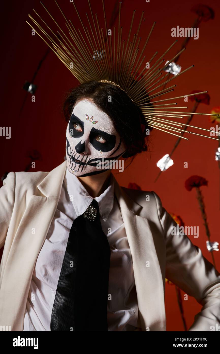 elegant woman in dia de los muertos catrina makeup and crown looking ...