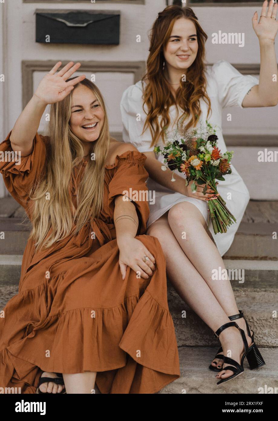 Old women waving hi-res stock photography and images - Alamy