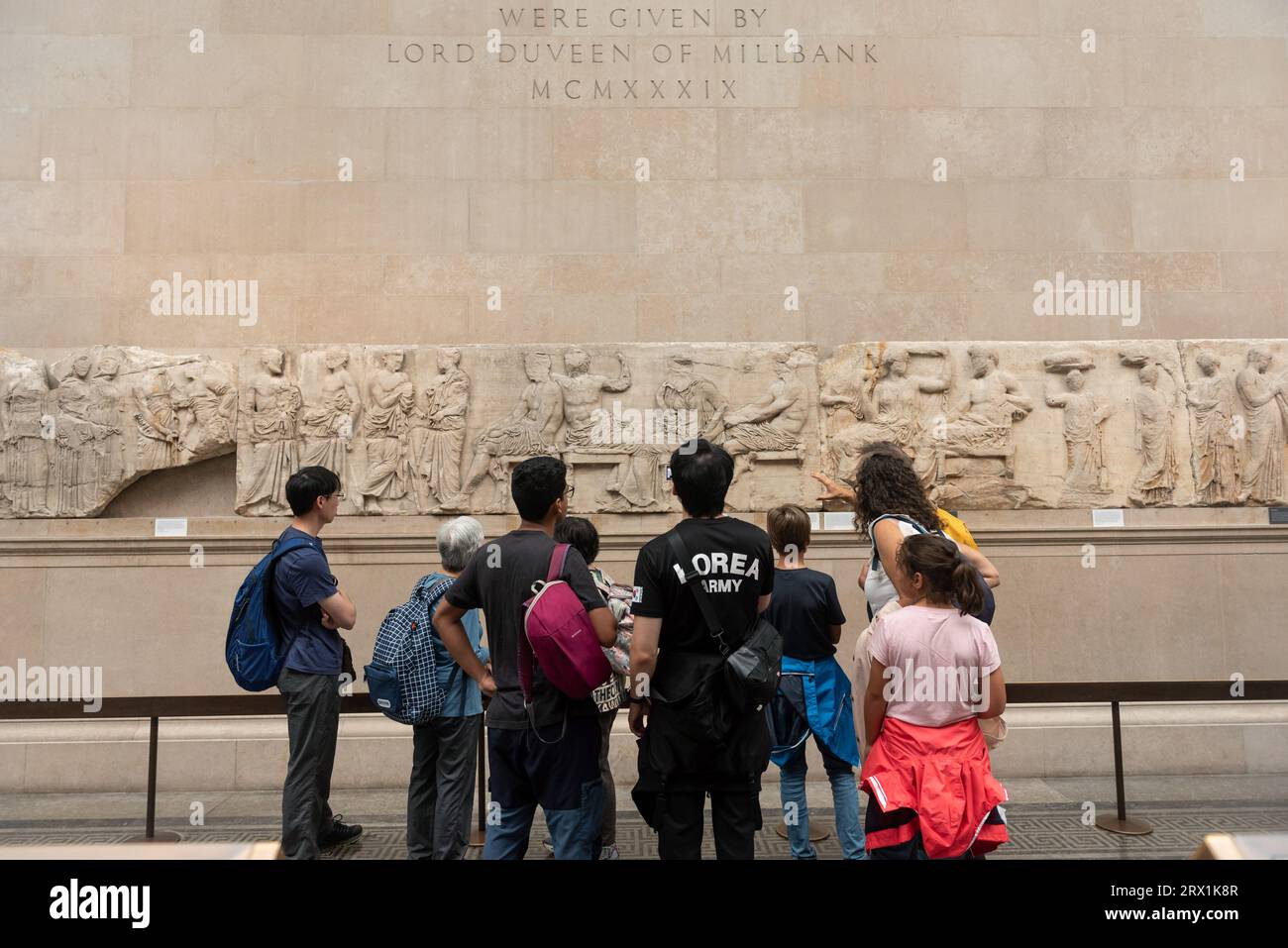 Visitors observe the Elgin Marbles, a collection of Greek sculptures ...