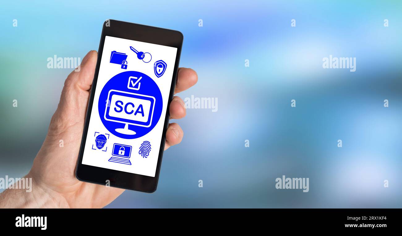 Hand holding a smartphone with sca concept Stock Photo - Alamy