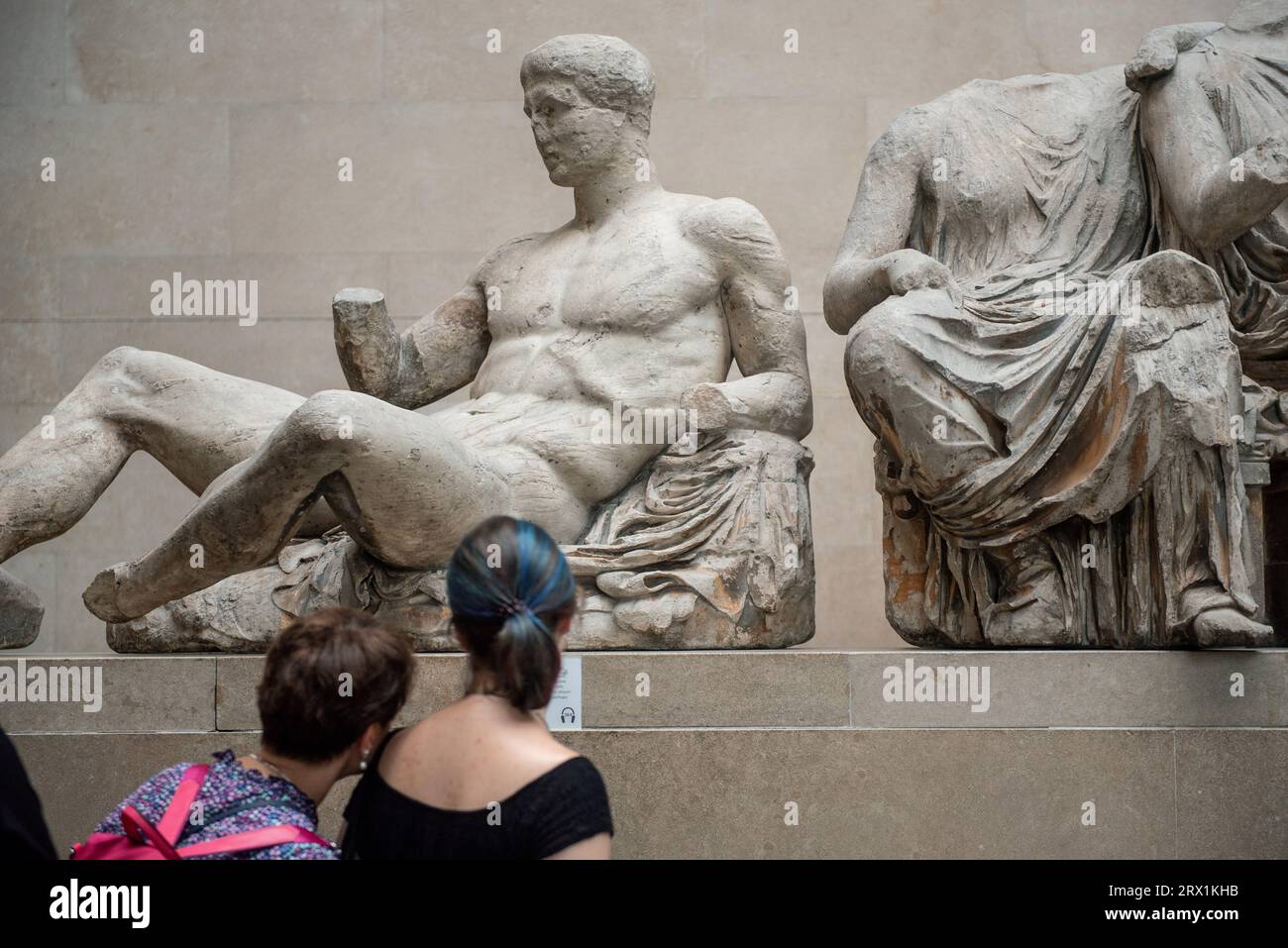 London, UK. 02nd Aug, 2023. Visitors observe the Elgin Marbles, a collection of Greek sculptures ...