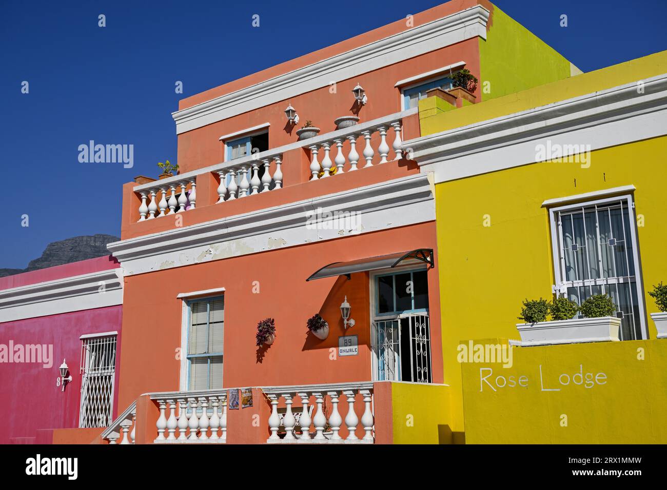 Colourful house facades in De Waal Street, Wale Street, Bo-Kaap or ...