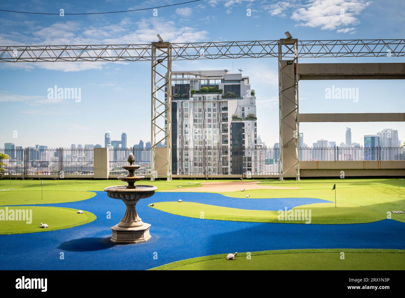 A golf putting course on the roof of The Baiyoke Sky Hotel in the ...