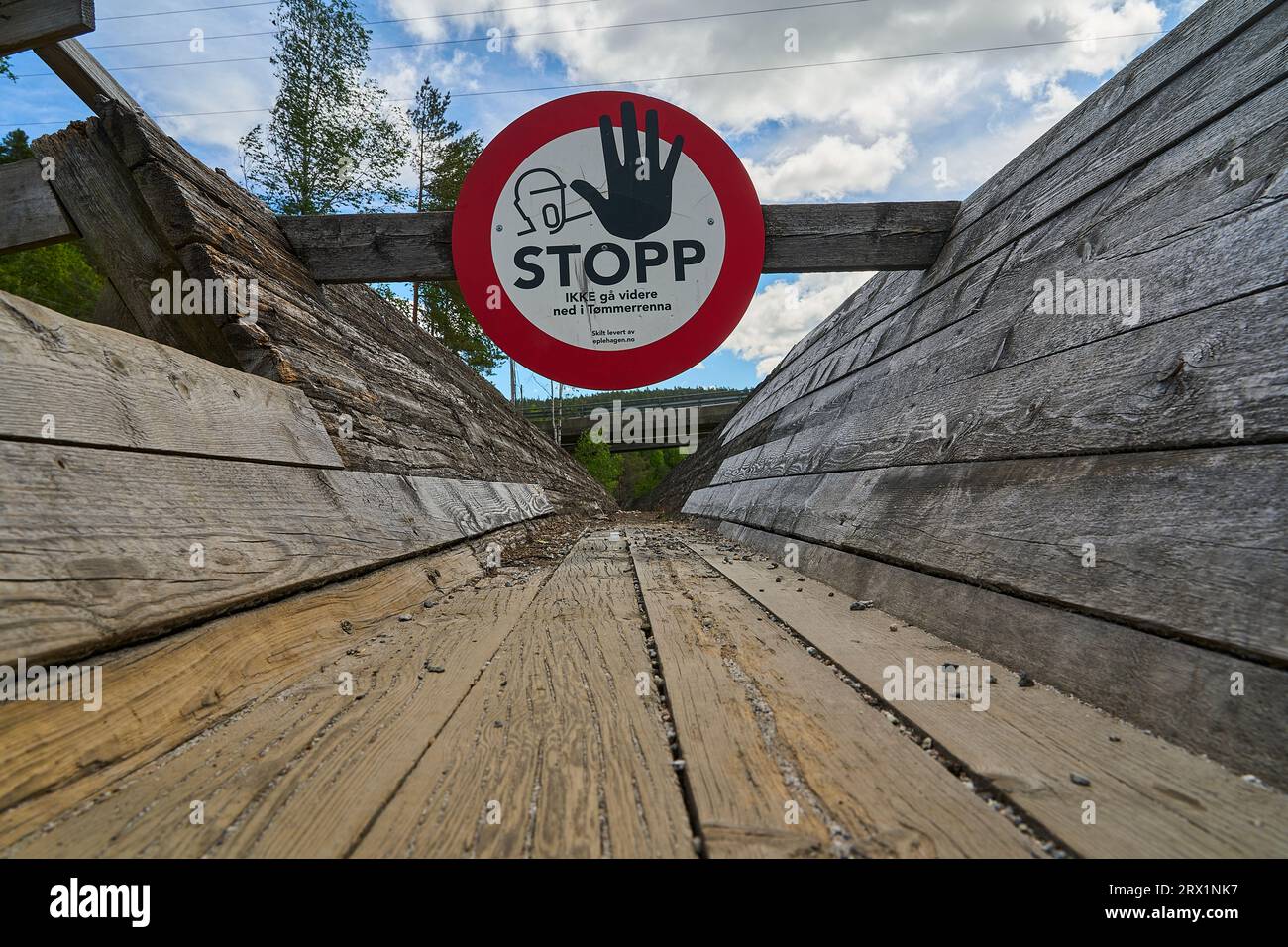 Stop sign at the log flume of the historic restored wooden raft channel ...