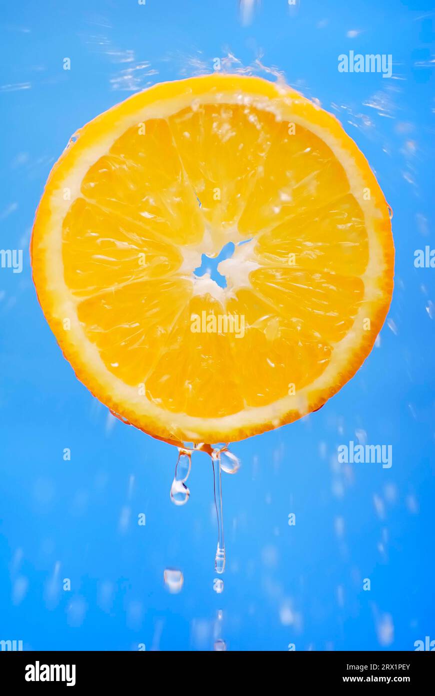 Orange slice with water drop Stock Photo - Alamy