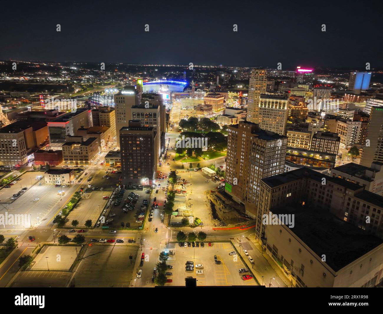 An aerial view of the cityscape of Detroit, Michigan, USA illuminated ...