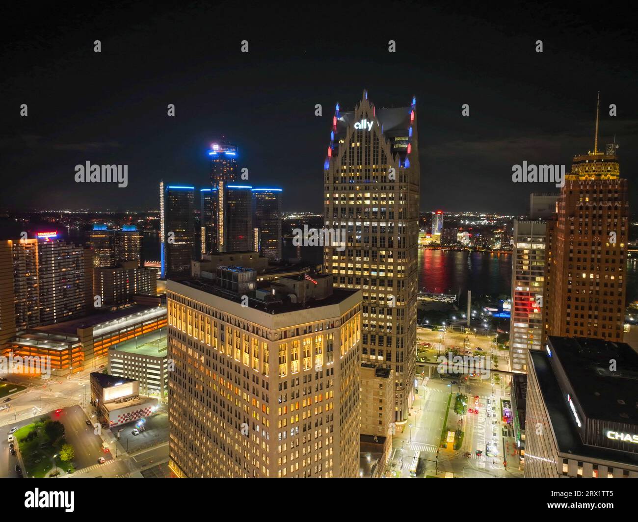 An aerial view of the cityscape of Detroit, Michigan, USA illuminated ...