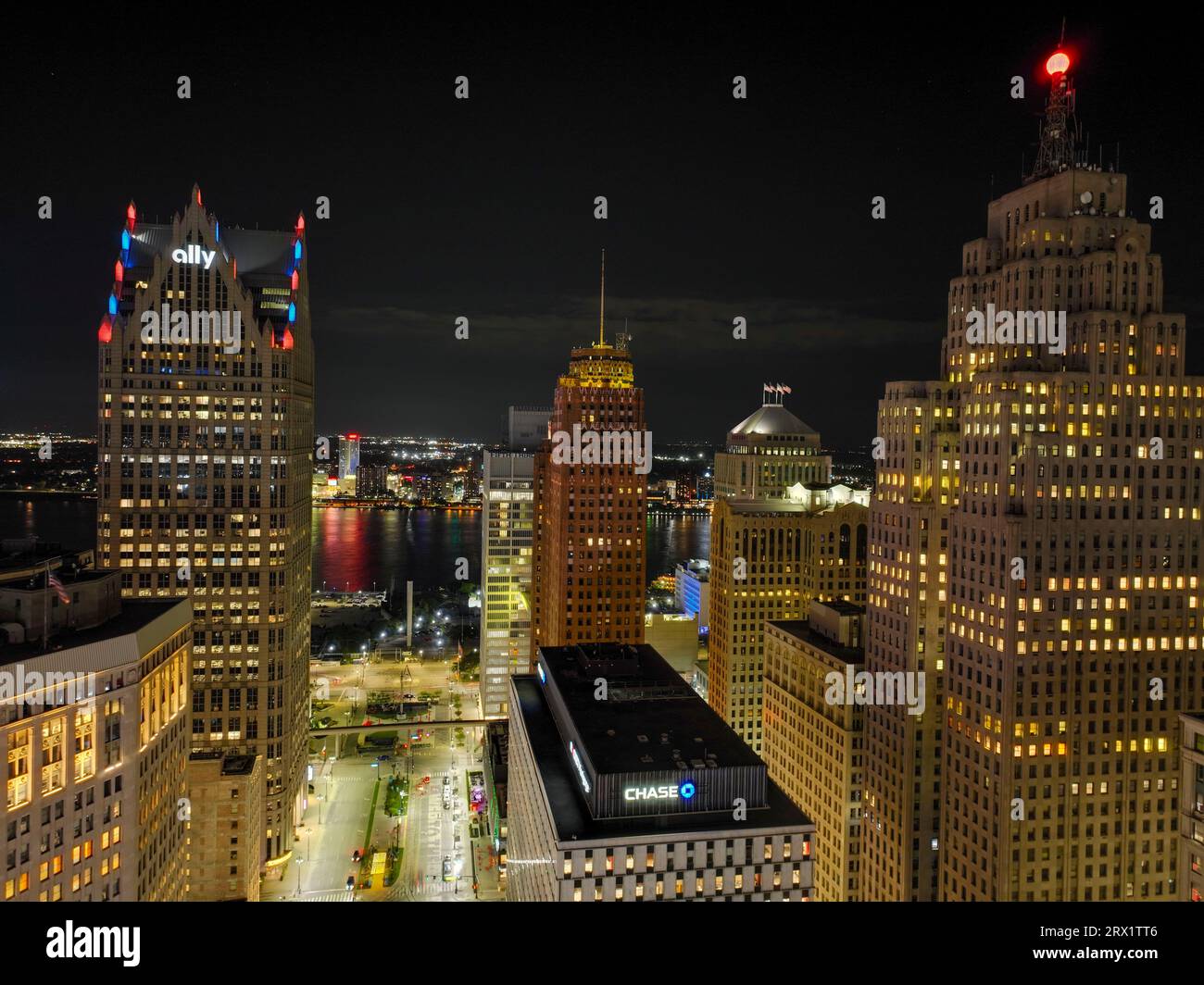 An aerial view of the cityscape of Detroit, Michigan, USA illuminated ...